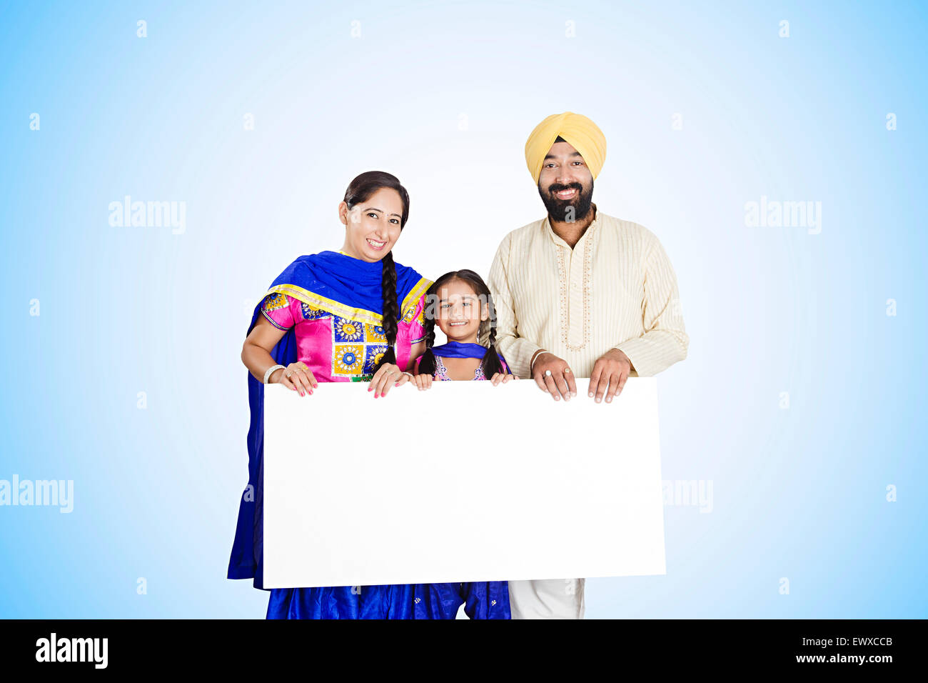 Indian punjabi parents daughter standing hi-res stock photography and ...