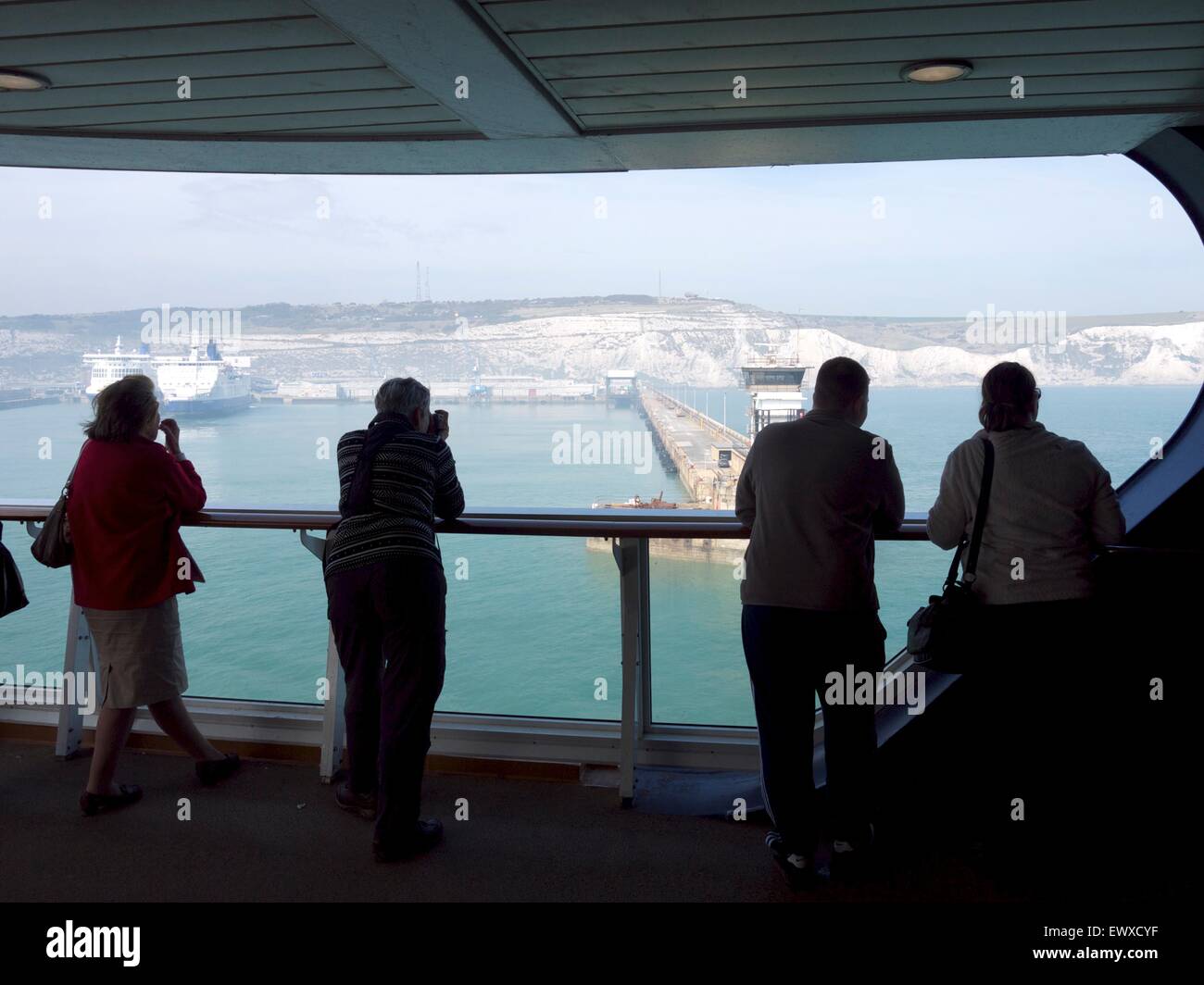 People on the deck of a Ferry leaving port Stock Photo - Alamy