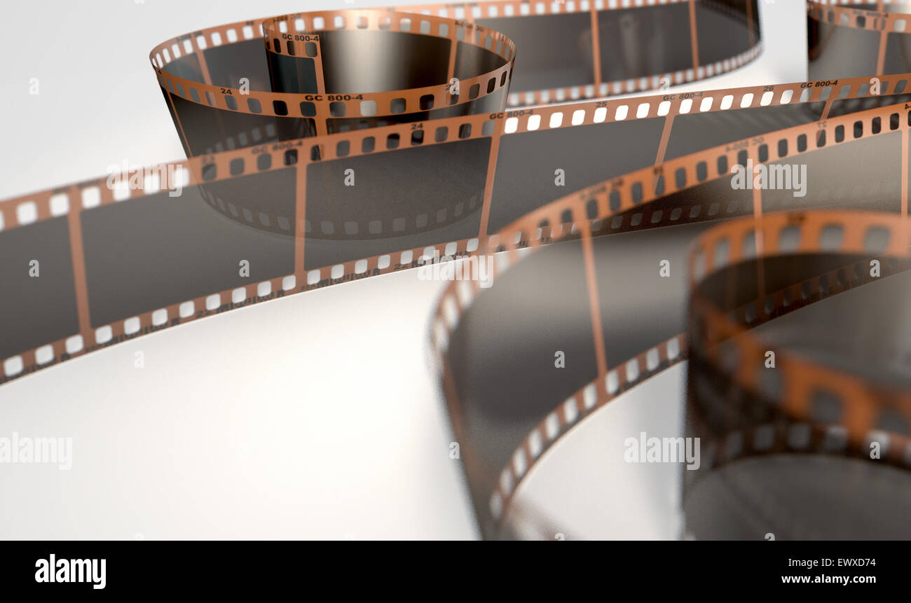 A strip of blank old vintage camera film curled up on an isolaed studio ...
