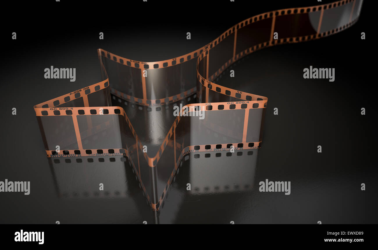 A strip of blank old vintage camera film curled into the shape of a ...
