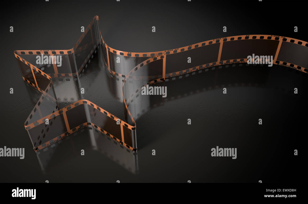 A strip of blank old vintage camera film curled into the shape of a ...