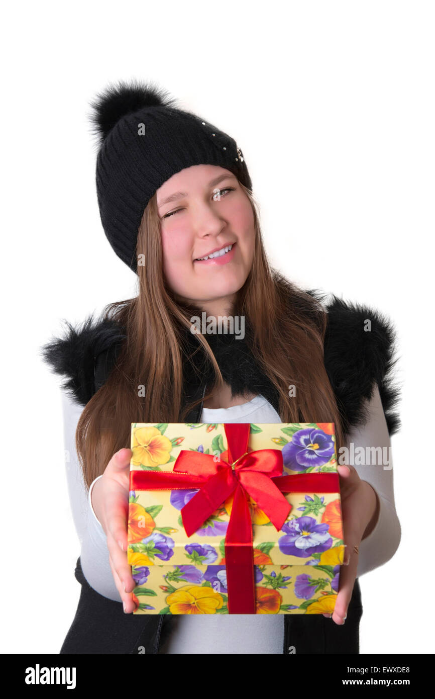 girl in hat winking with a gift Stock Photo - Alamy