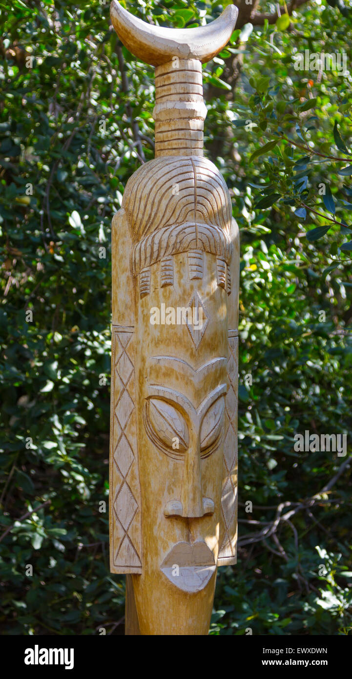 African masks wooden totem sculptures Stock Photo - Alamy