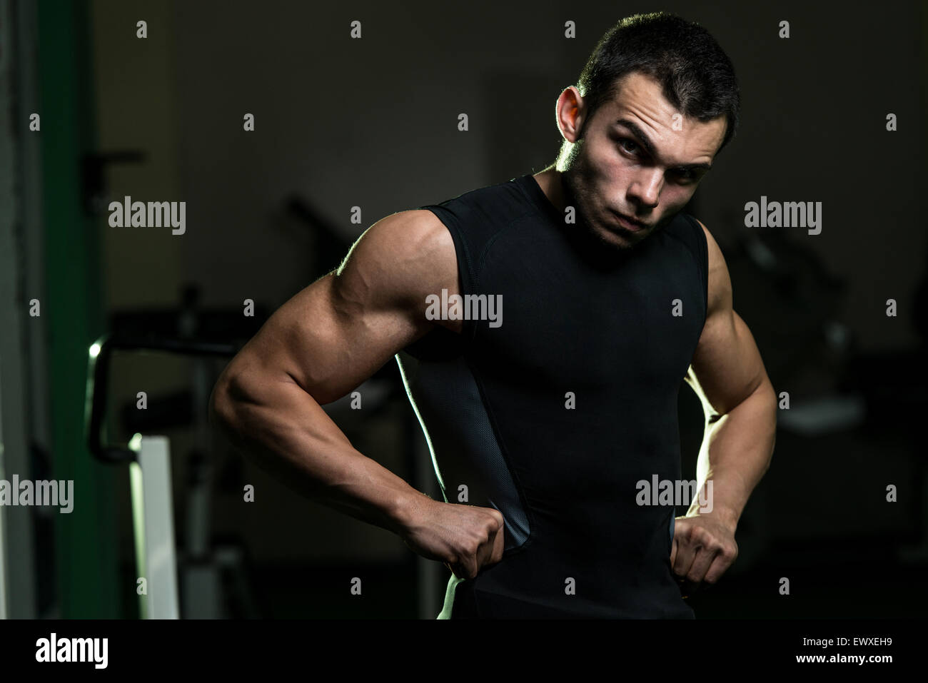 A Muscular Male Model Staring Confidently Stock Photo - Alamy