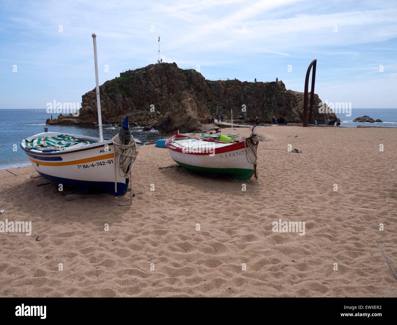 Rowing boats on a beach in Spain Stock Photo - Alamy