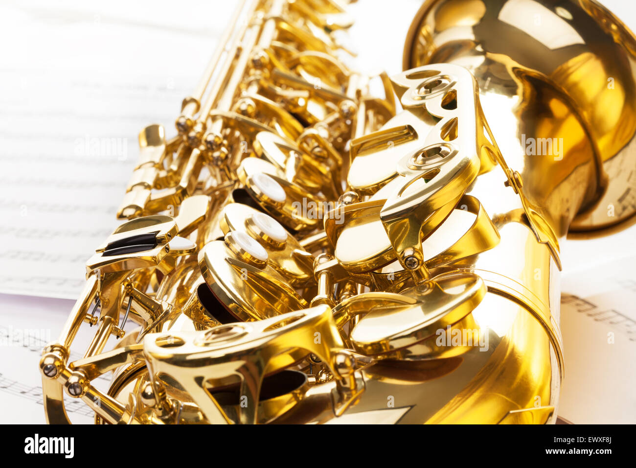 Shiny golden bell and keys of alto saxophone Stock Photo - Alamy