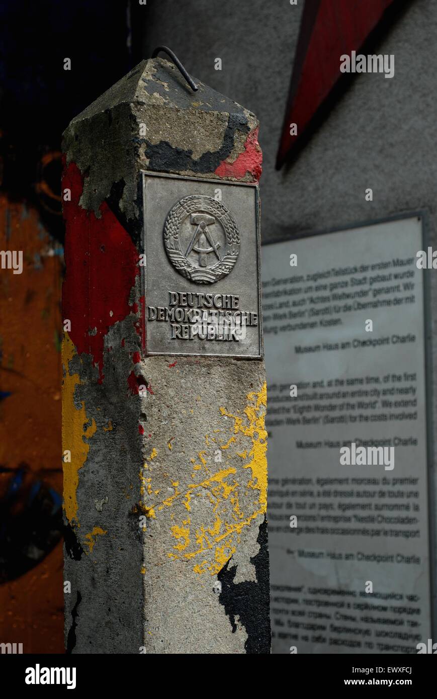 Memorial post bearing DDR name at Checkpoint Charlie in Berlin, Germany ...