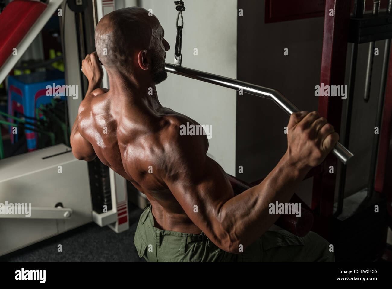 Mature Man Doing Back Exercises In The Gym Stock Photo - Alamy