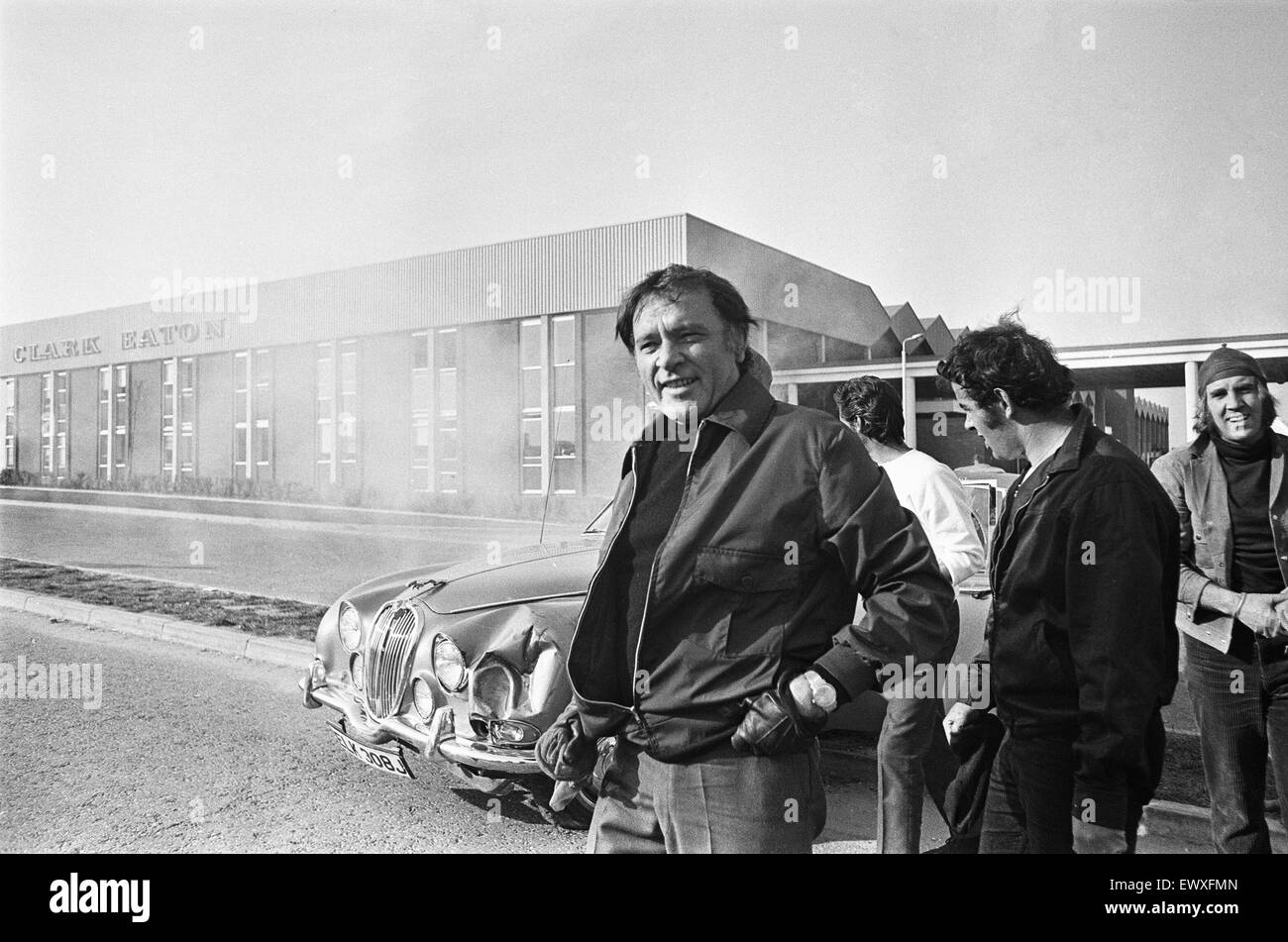Richard Burton during location filming of "The Villain" . The cast and ...