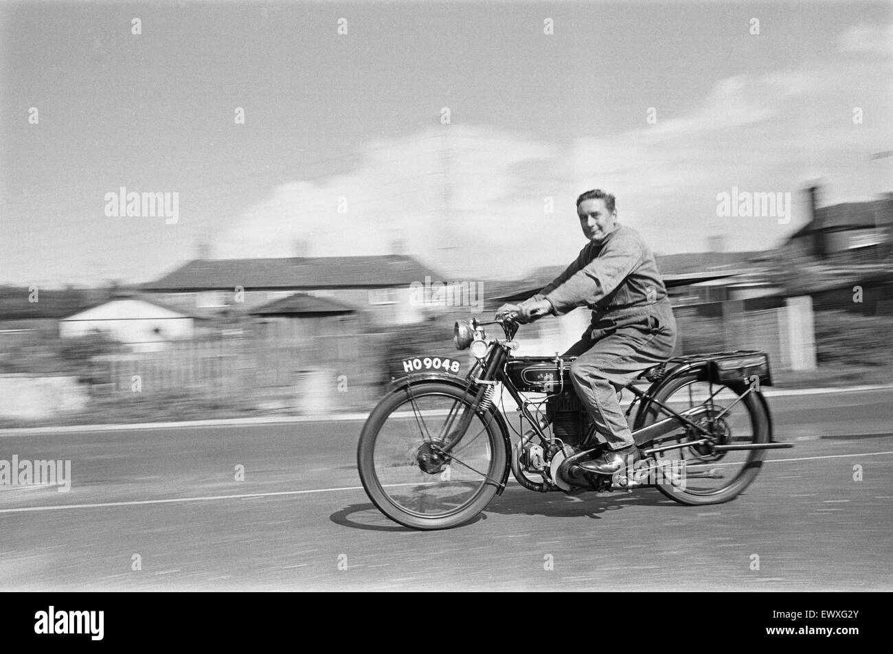 A vintage motorbike enthusiast out for a Sunday ride on his 1928 AJS ...