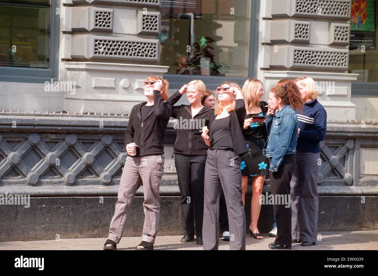 People watching a total solar eclipse, Queen Street, Cardiff. 11th ...