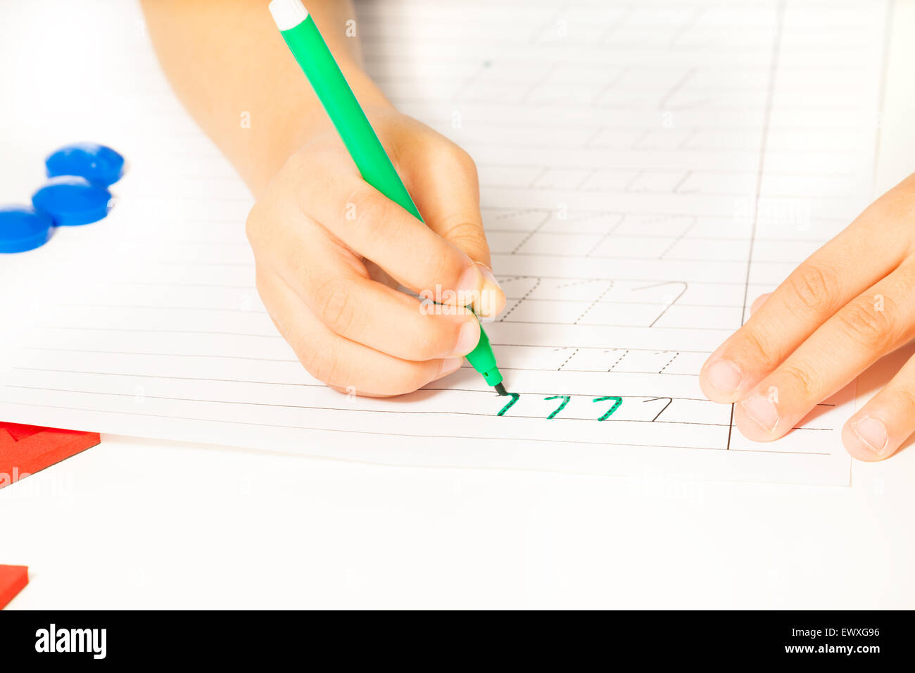 Close-up view of kids hands writing letters Stock Photo - Alamy