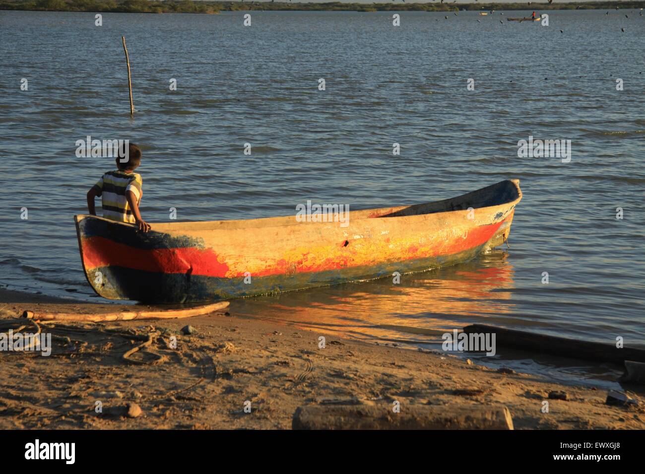 Boy in a Boat Stock Photo - Alamy