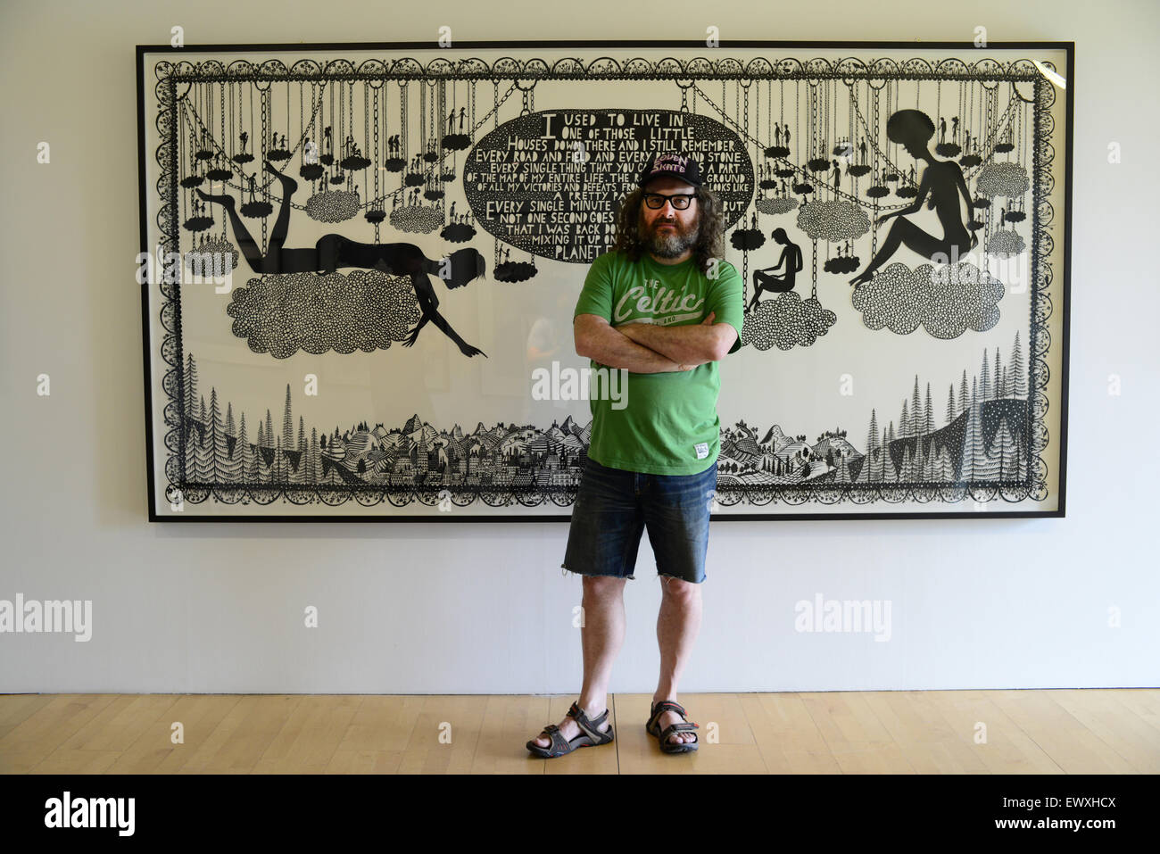 Fine artist Rob Ryan is shown at Yorkshire Sculpture Park with some of ...