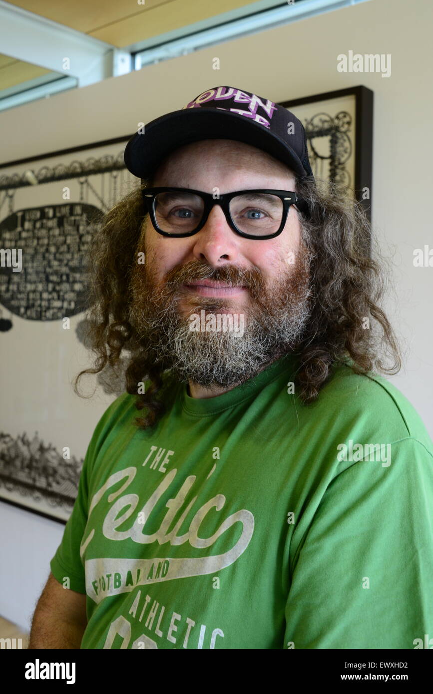 Fine artist Rob Ryan is shown at Yorkshire Sculpture Park with some of ...