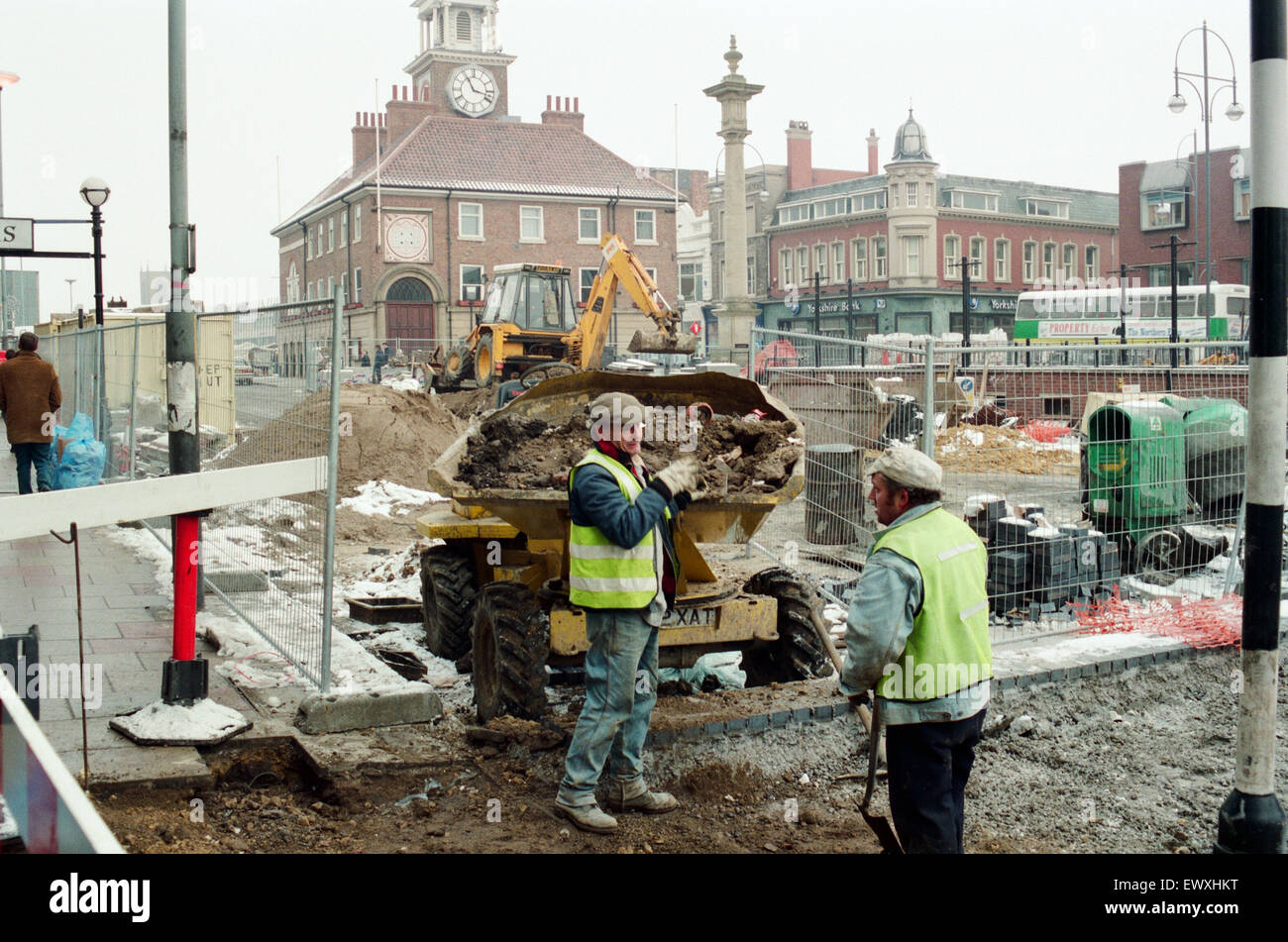 Workmen try to beat the freezing weather, before daytime work on ...