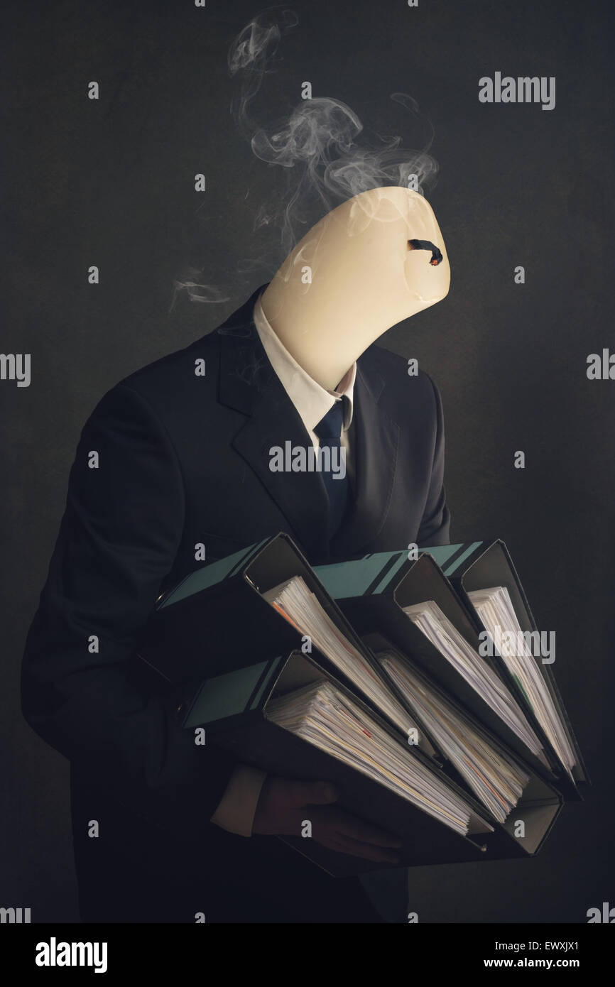 Symbol of a employee with burn out syndrome Stock Photo - Alamy