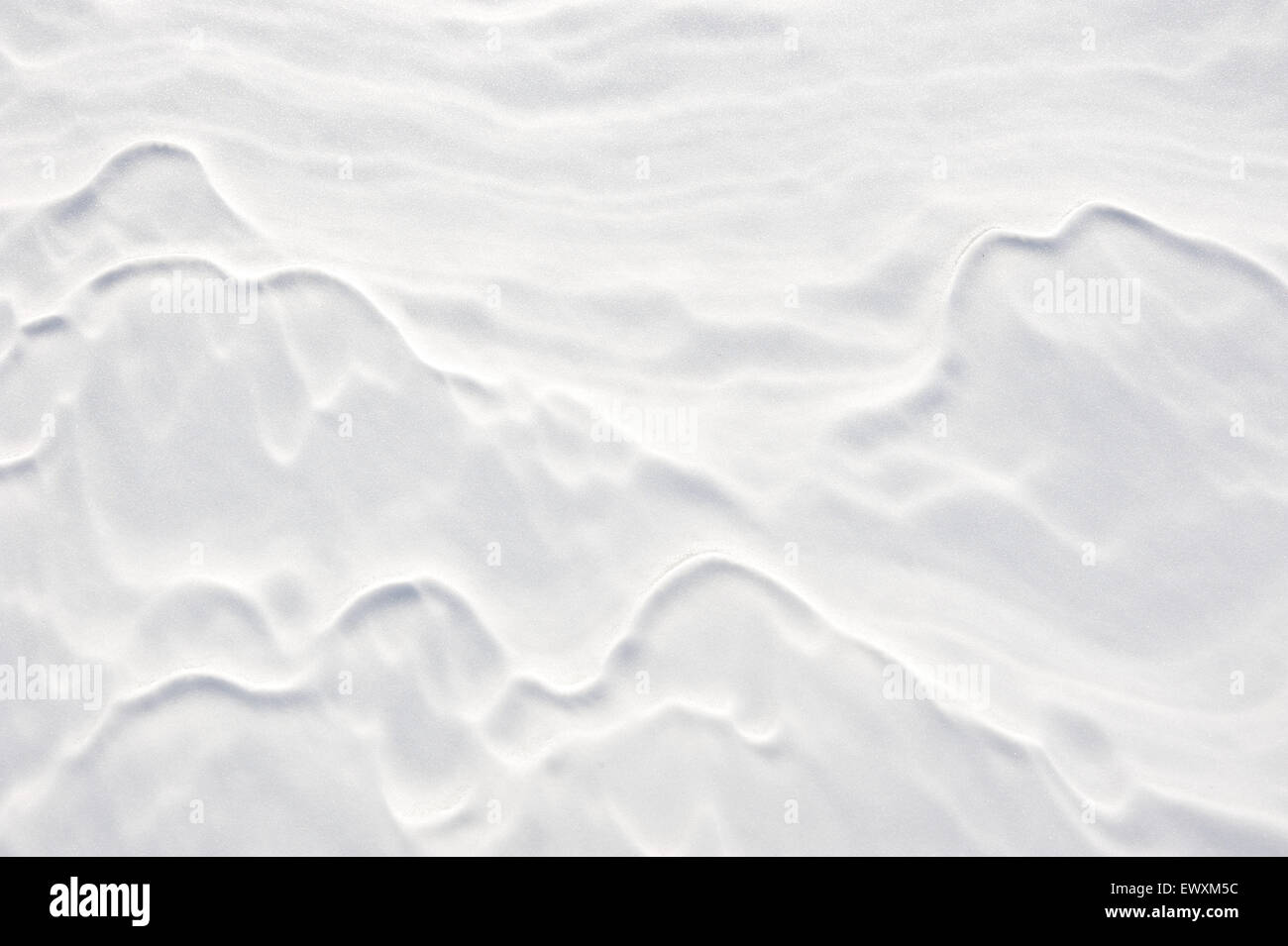 Thin crust of ice over snow Stock Photo - Alamy