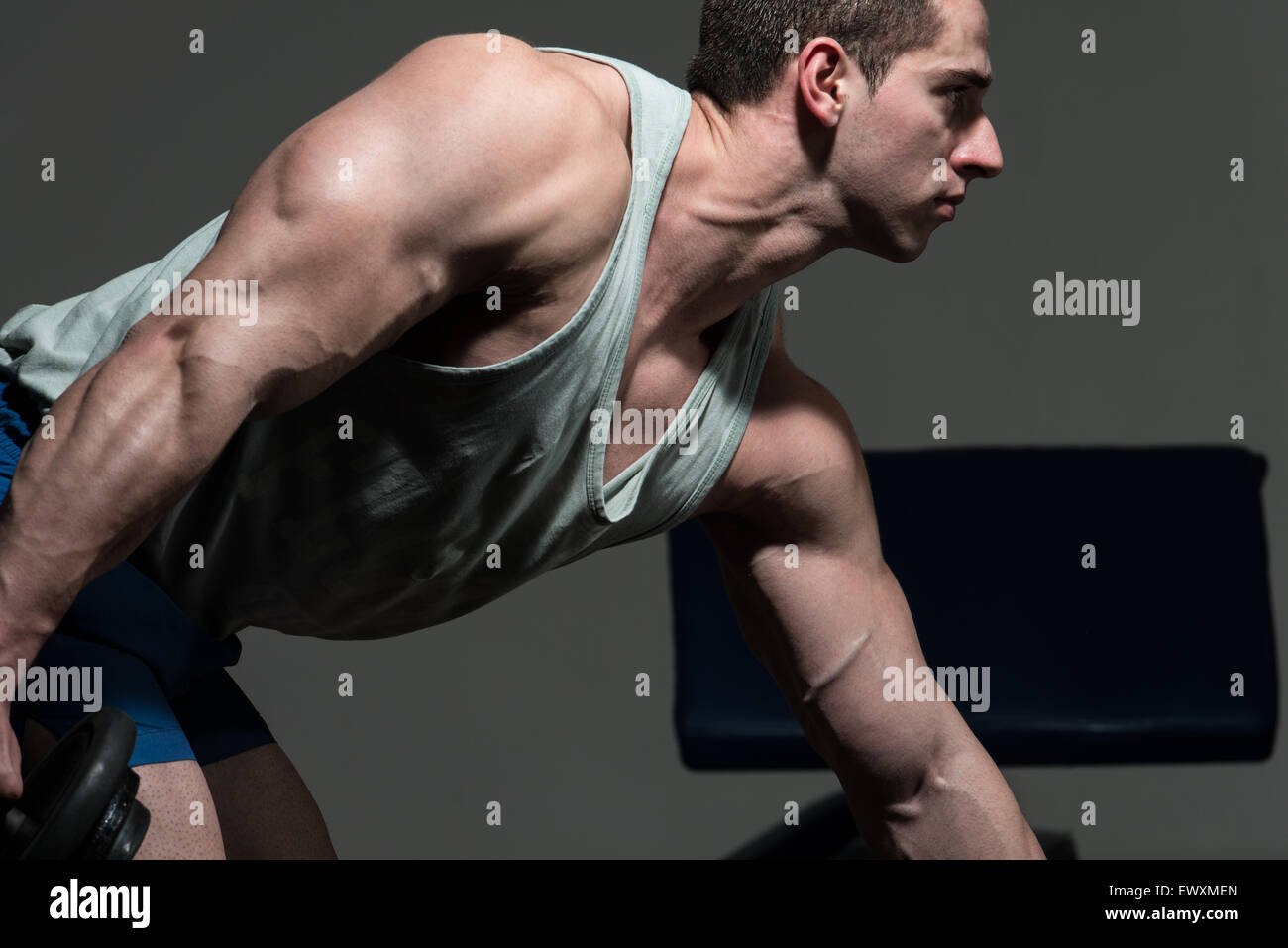 Young Bodybuilder Exercise Triceps In The Gym Stock Photo - Alamy
