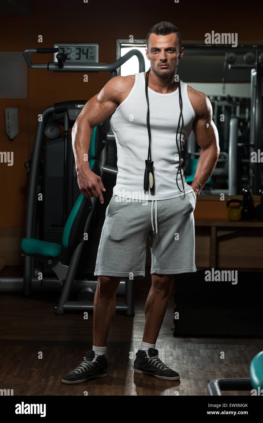 Handsome Muscular Man With Jumping Rope - Cardio Time Stock Photo - Alamy
