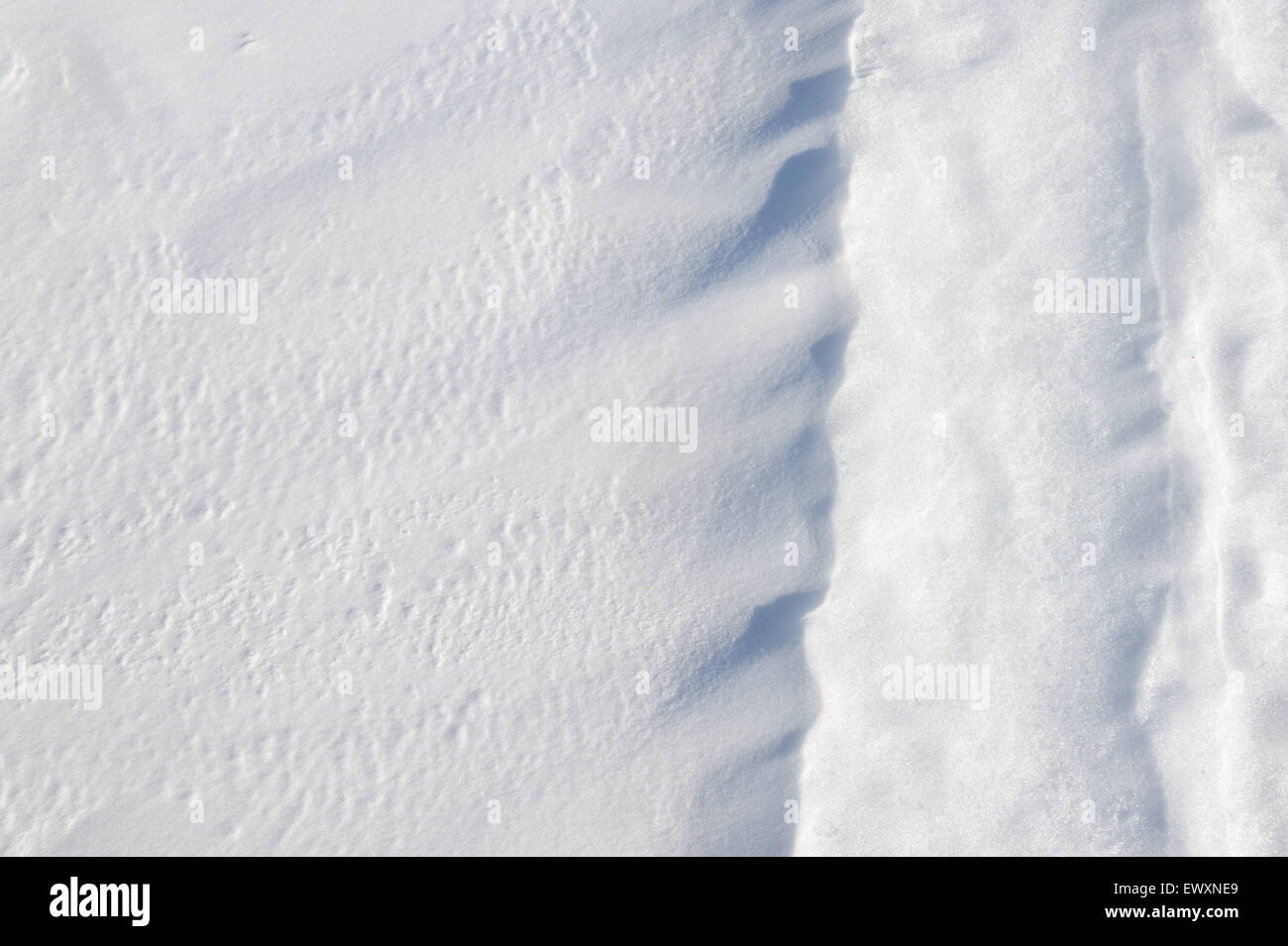 Thin crust of ice over snow Stock Photo - Alamy