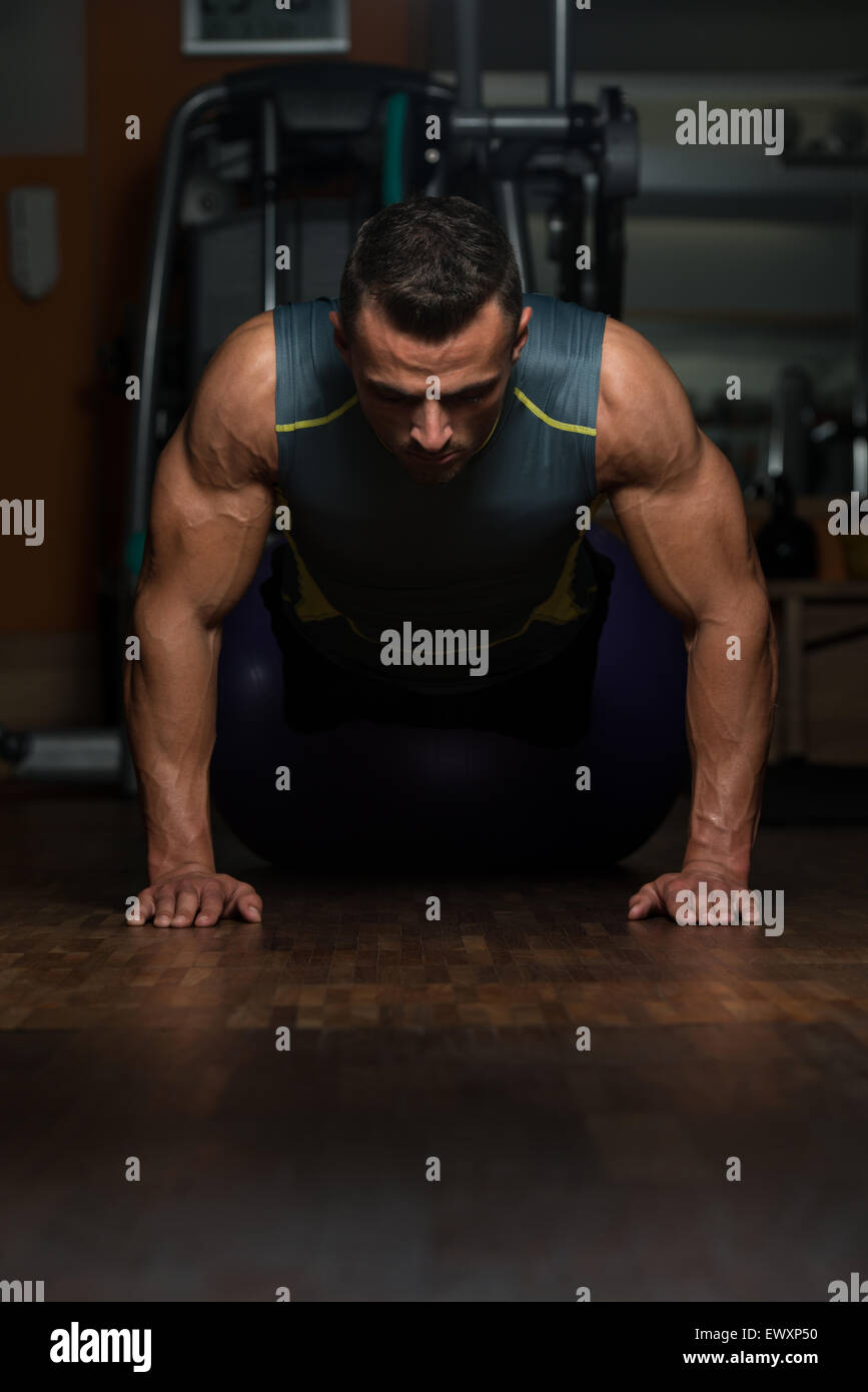 Young Athlete Doing Pushups As Part Of Bodybuilding Training Stock ...
