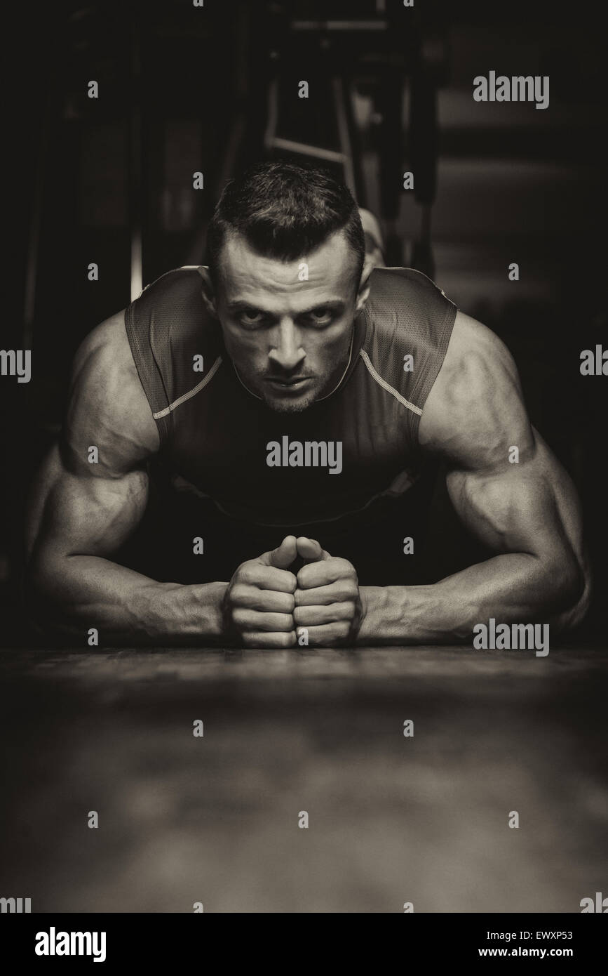 Young Athlete Doing Pushups As Part Of Bodybuilding Training Stock ...