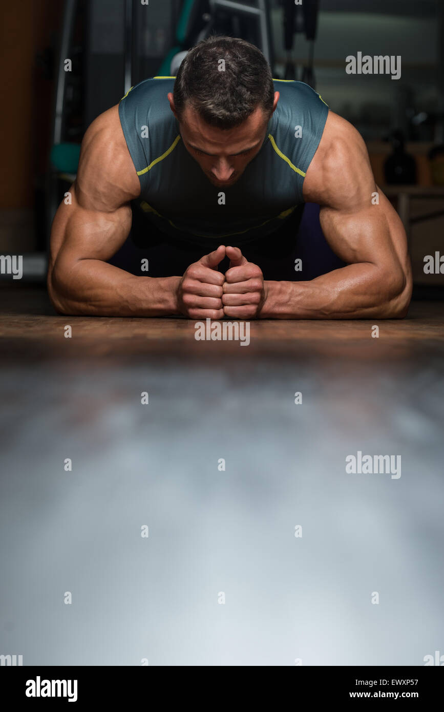 Young Athlete Doing Pushups As Part Of Bodybuilding Training Stock ...