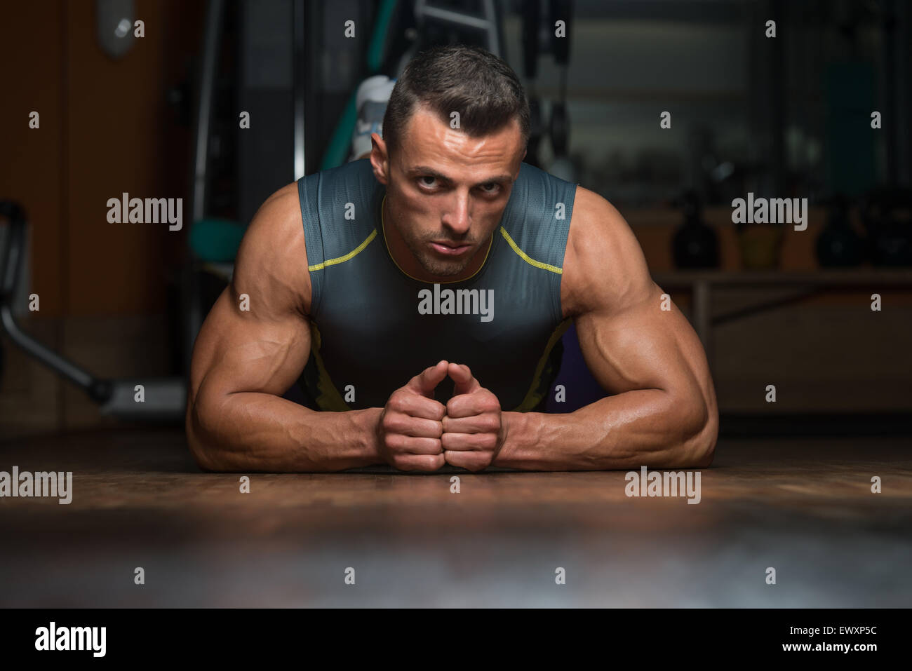 Young Athlete Doing Pushups As Part Of Bodybuilding Training Stock ...