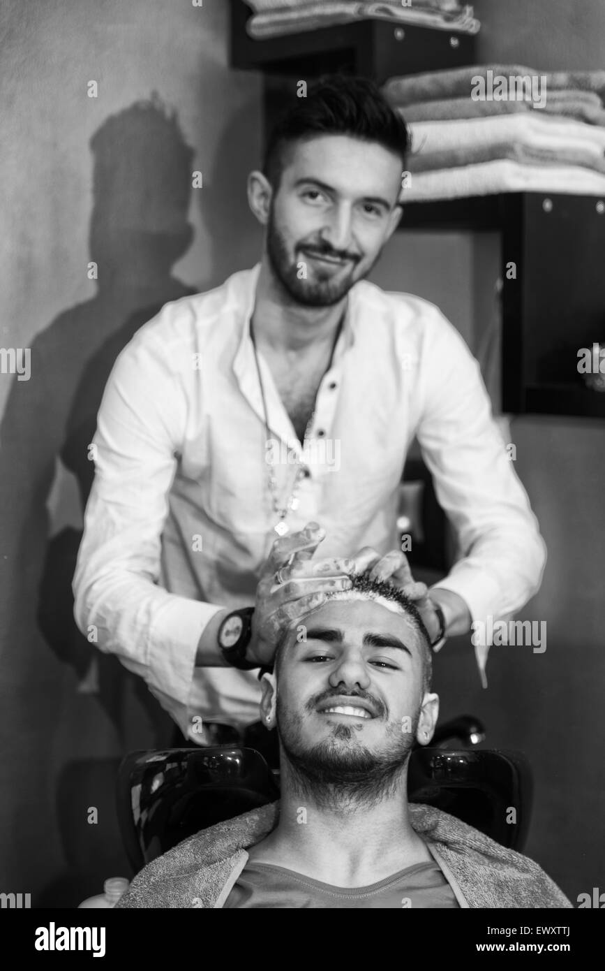 Hair washing Black and White Stock Photos & Images - Alamy