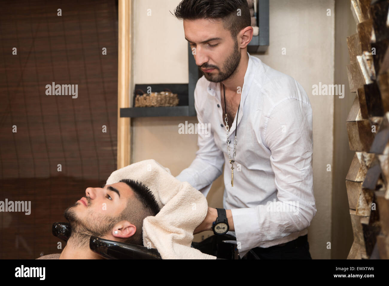 Hairstylist Hairdresser Washing Customer Hair - Young Man Relaxing In ...