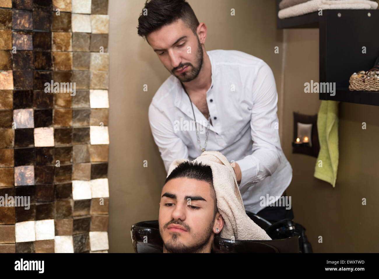 Hairstylist Hairdresser Washing Customer Hair - Young Man Relaxing In ...
