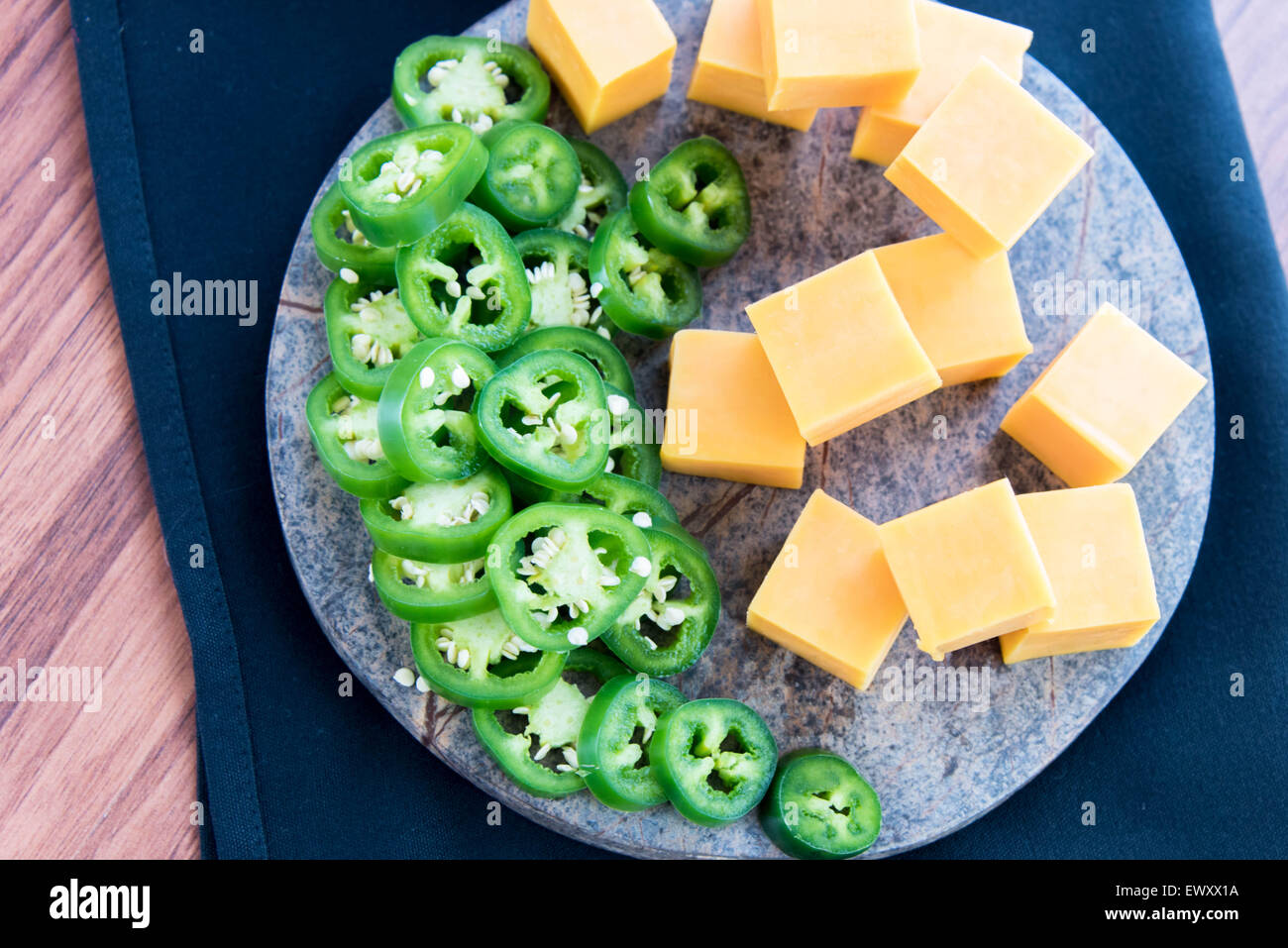 fresh sliced jalapeno peppers and cheddar cheese Stock Photo - Alamy