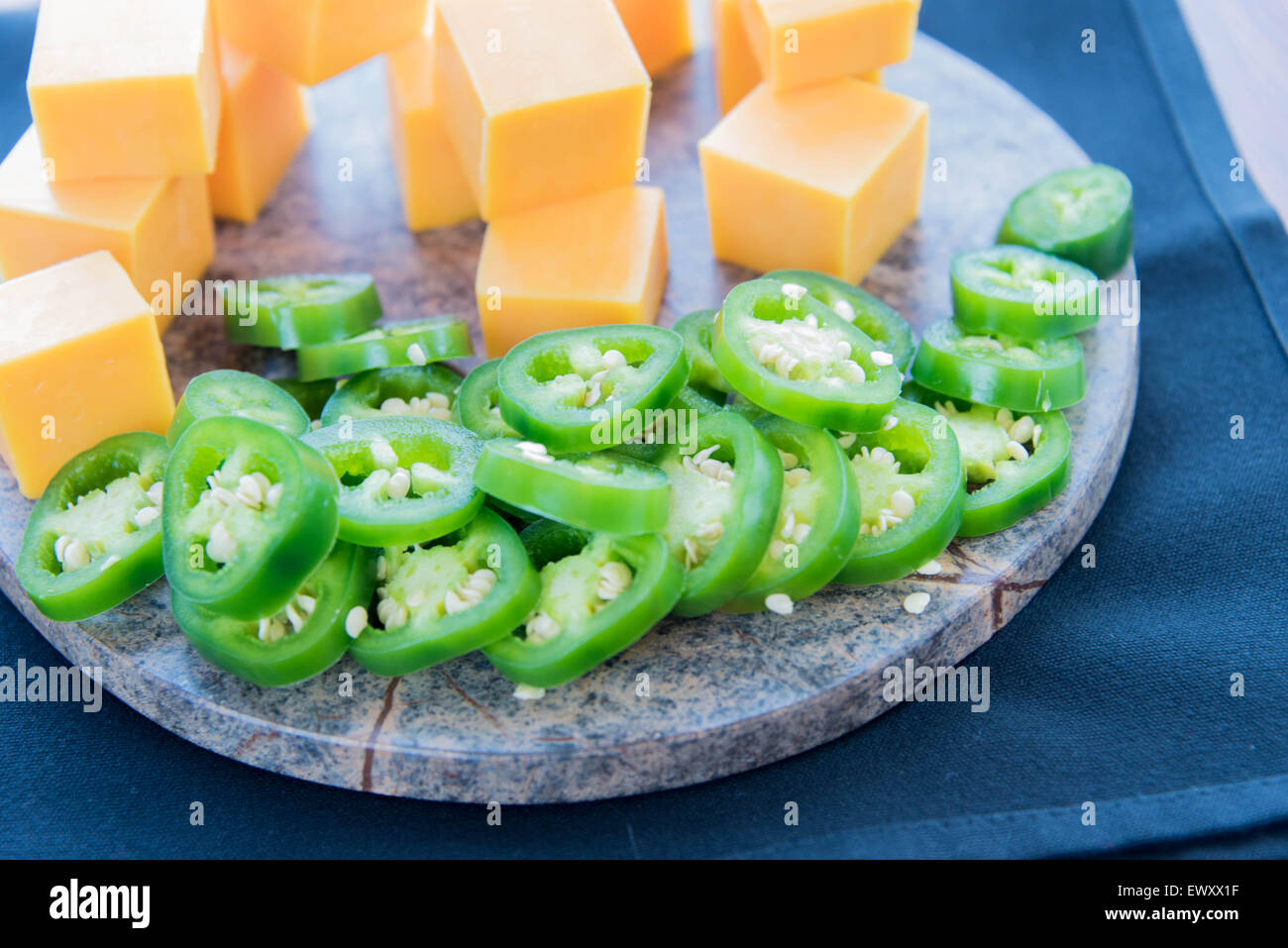fresh sliced jalapeno peppers and cheddar cheese Stock Photo - Alamy