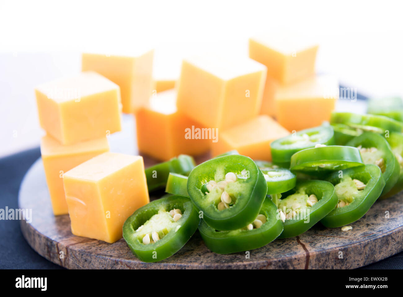 fresh sliced jalapeno peppers and cheddar cheese Stock Photo - Alamy