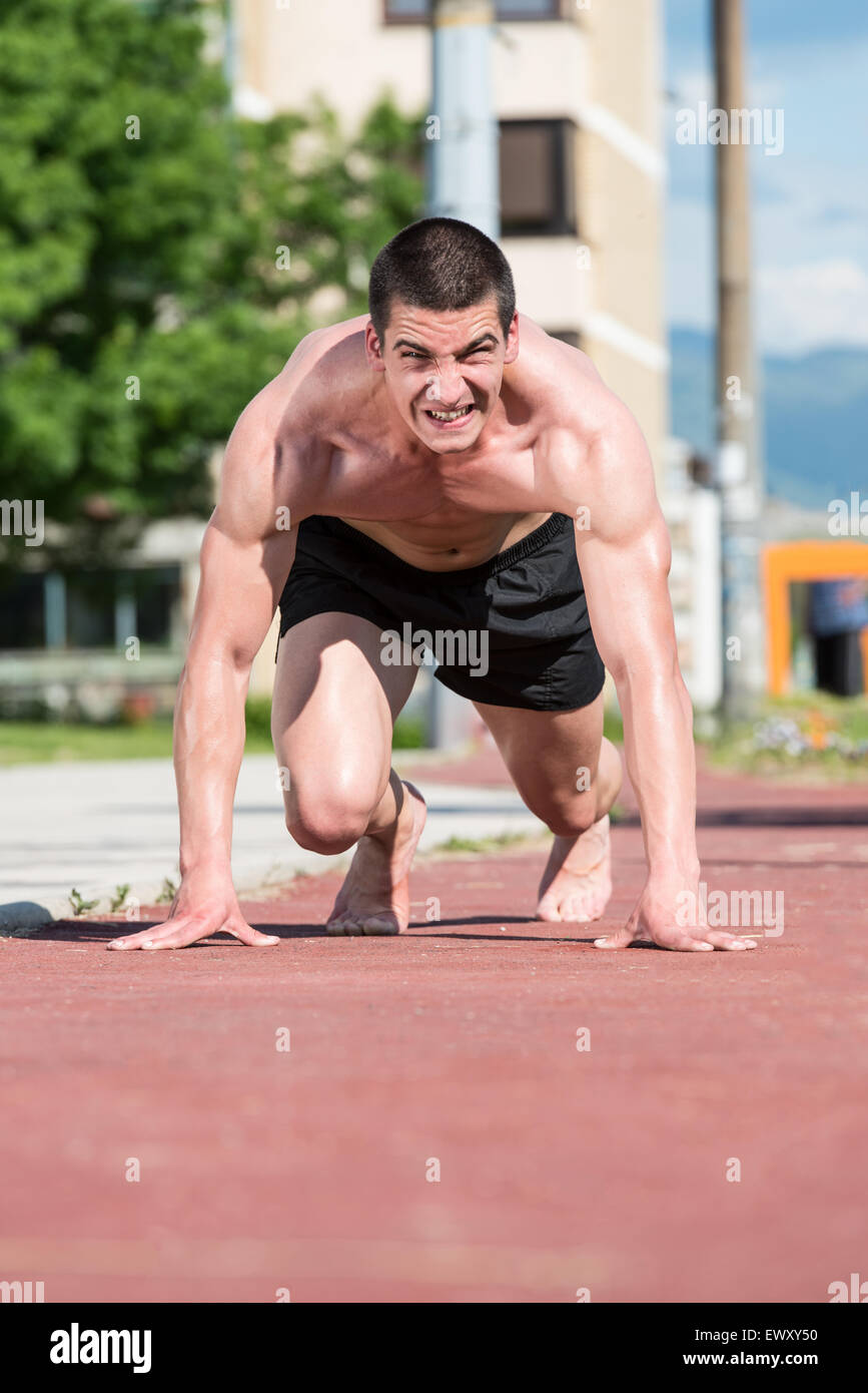 Men in starting position race hi-res stock photography and images - Alamy