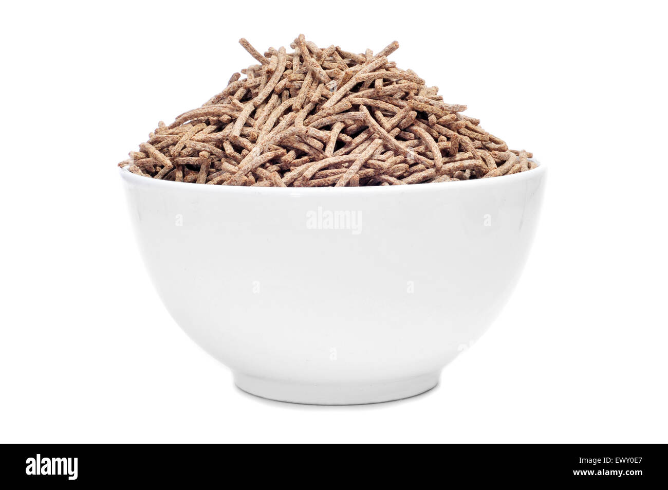 a bowl with cereal bran sticks on a white background Stock Photo - Alamy