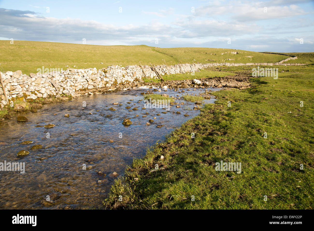 Stream sinking underground in limestone rock hi-res stock photography ...