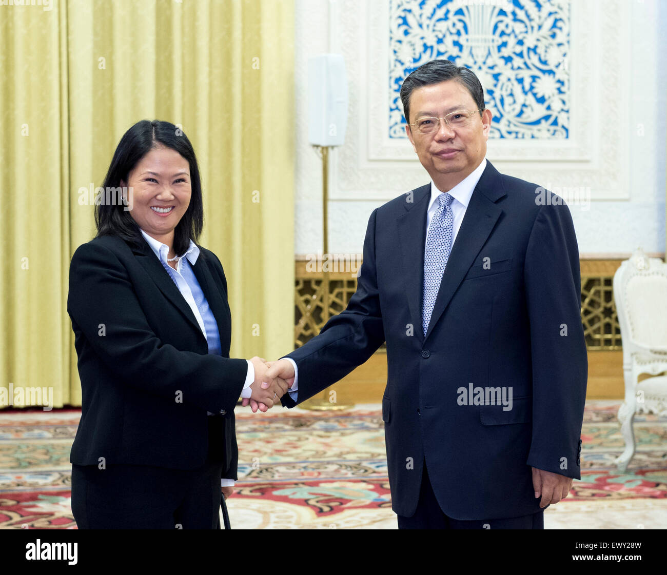 Beijing, China. 2nd July, 2015. Zhao Leji (R), a member of the ...