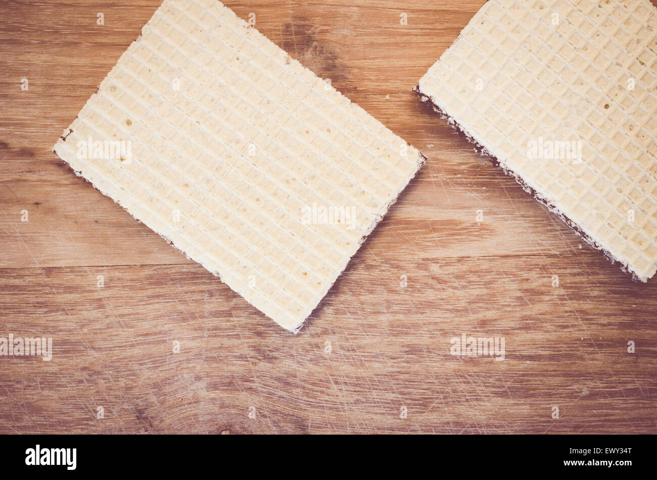 crisp and tasty wafers on a natural wood surface Stock Photo - Alamy