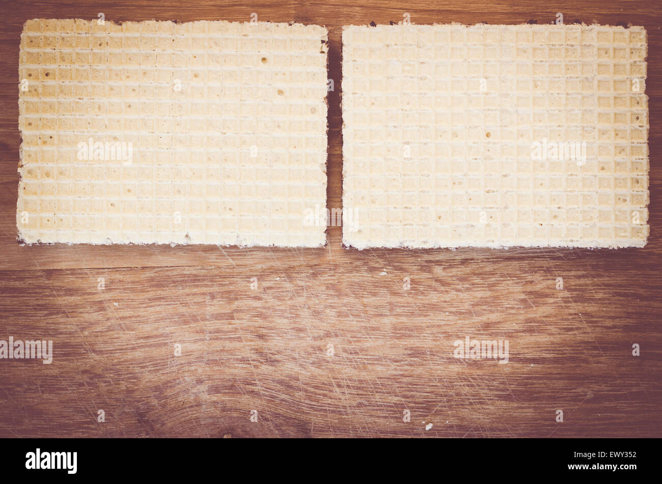 crisp and tasty wafers on a natural wood surface Stock Photo - Alamy