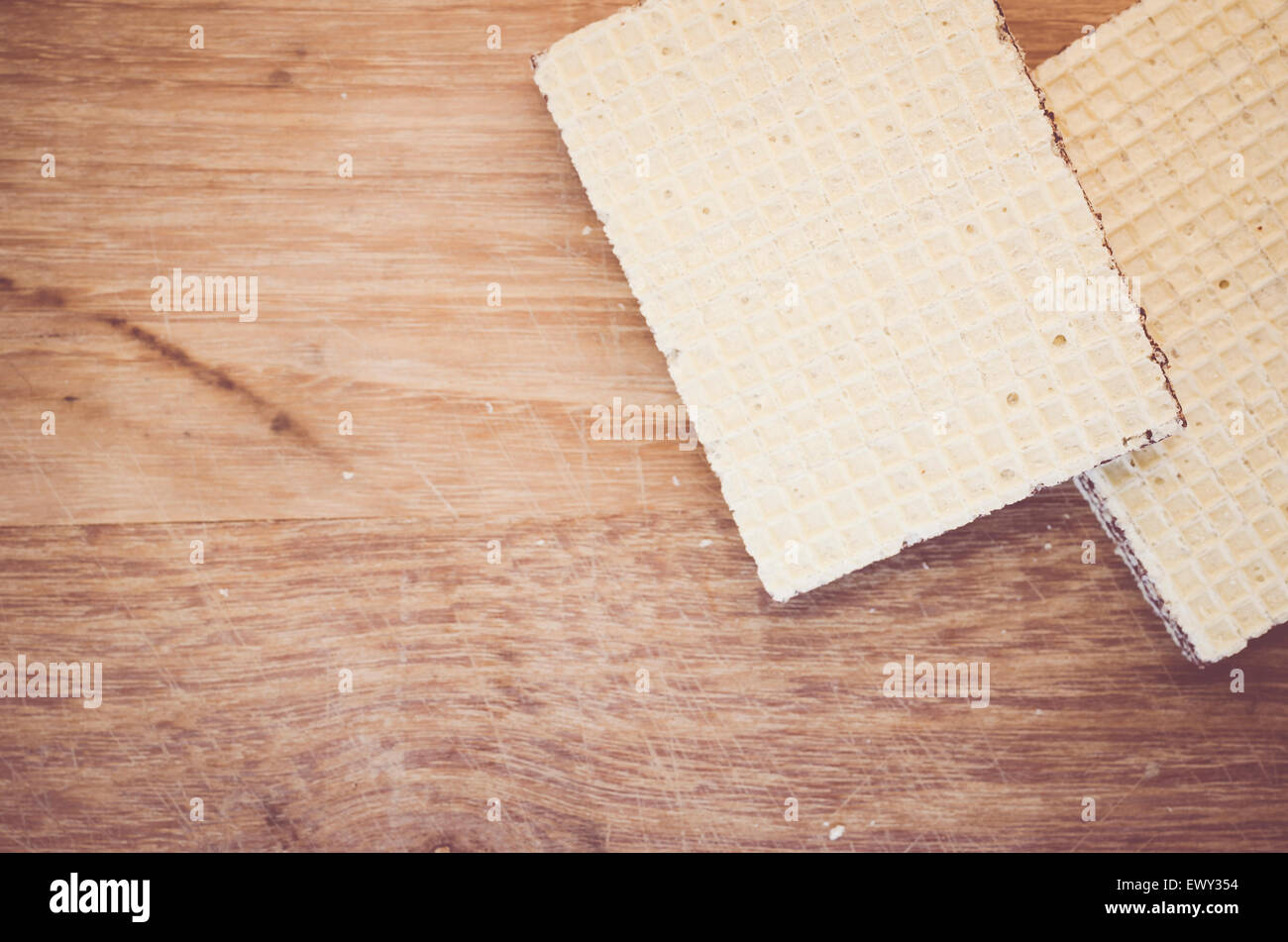 crisp and tasty wafers on a natural wood surface Stock Photo - Alamy