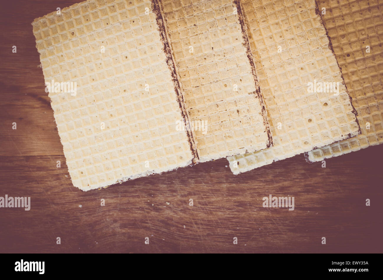 crisp and tasty wafers on a natural wood surface Stock Photo - Alamy