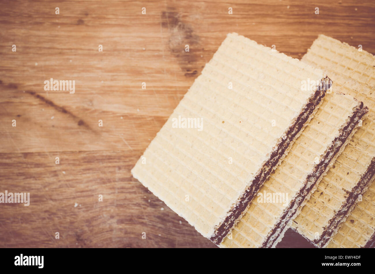 crisp and tasty wafers on a natural wood surface Stock Photo - Alamy