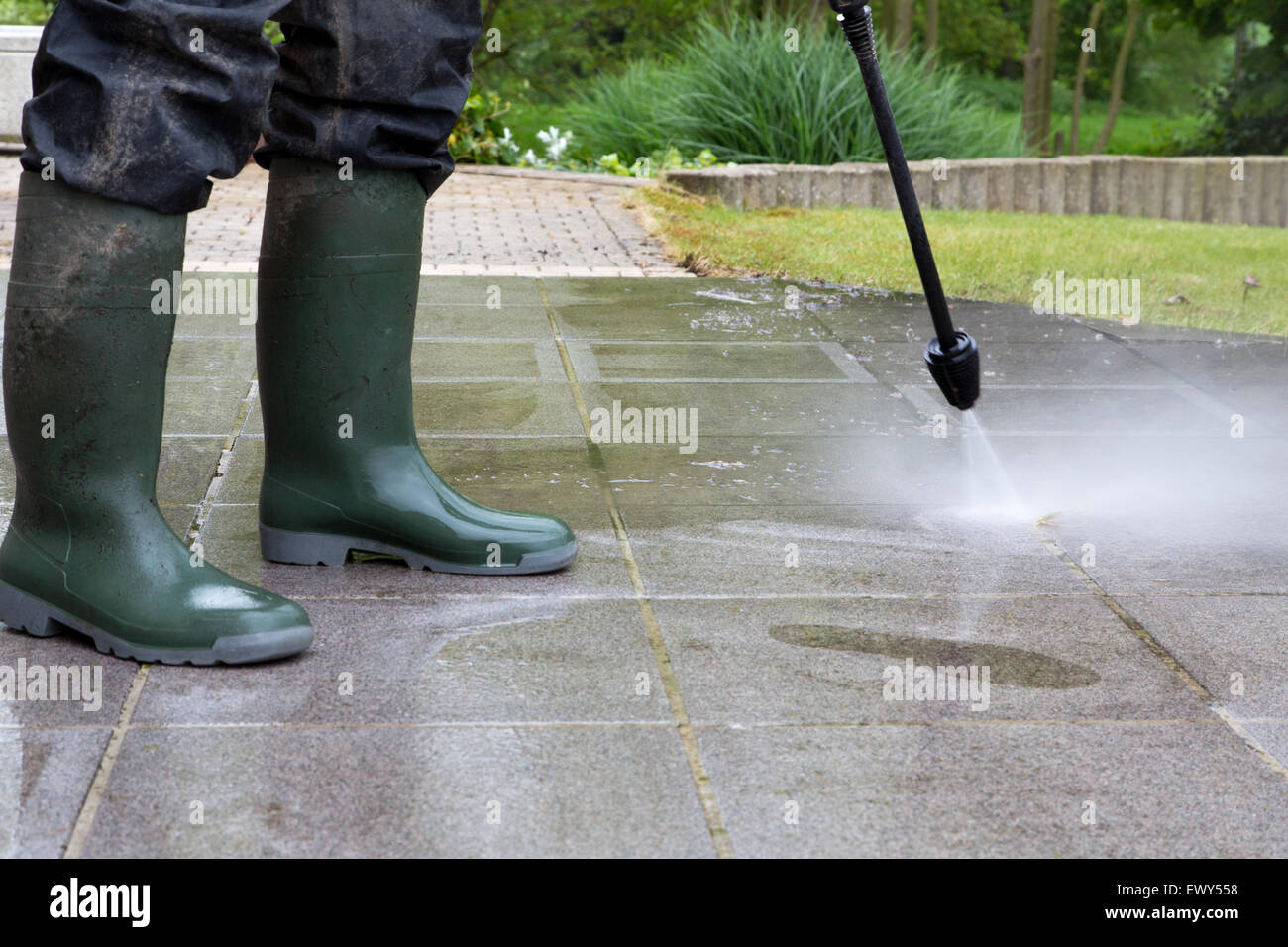 Outdoor floor cleaning with high pressure water jet Stock Photo - Alamy