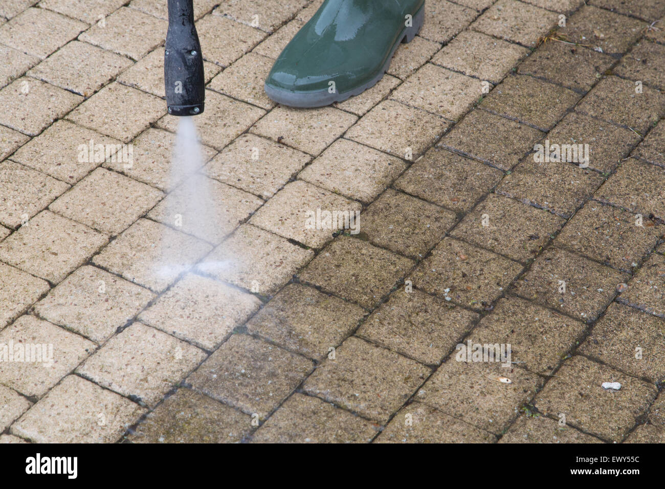 Outdoor floor cleaning with high pressure water jet Stock Photo - Alamy