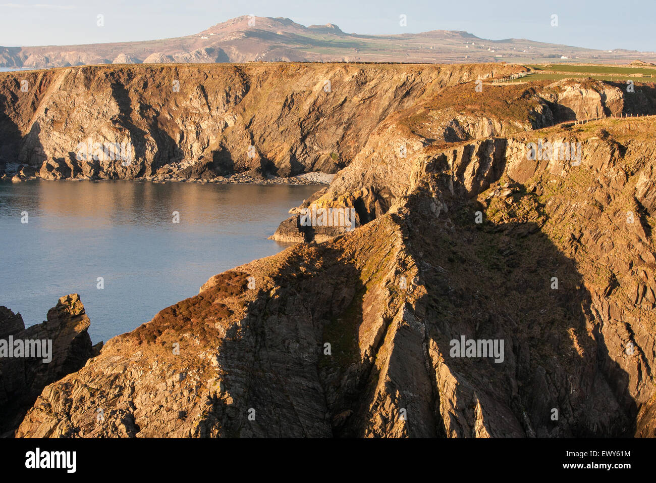 Cliffs at sundown near Trefin village on the Pembrokeshire Coast Path ...