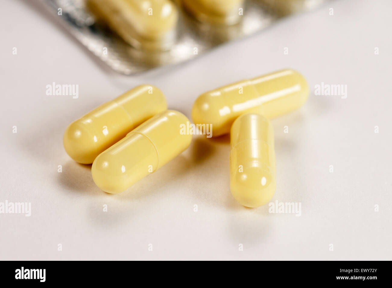 Capsulas of antibiotic over light background, macro shot Stock Photo ...