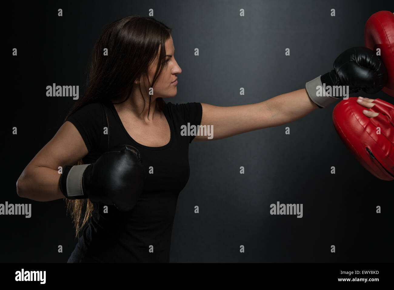 Bodybuilding Couple Posing With Boxing Gloves On Black Background Stock ...