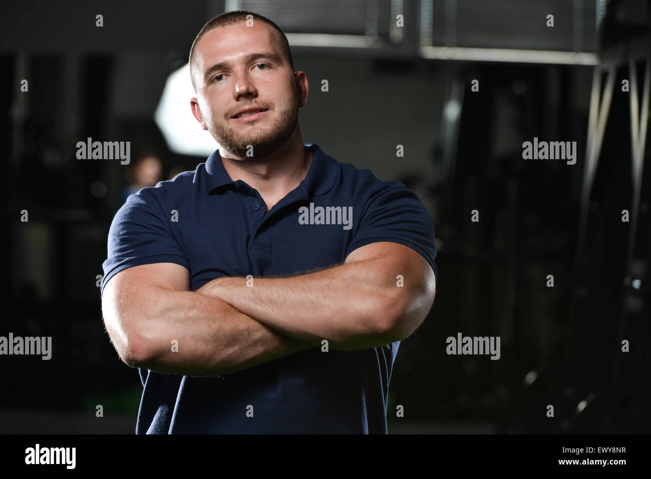 Handsome bodybuilder standing arms folded hi-res stock photography and ...
